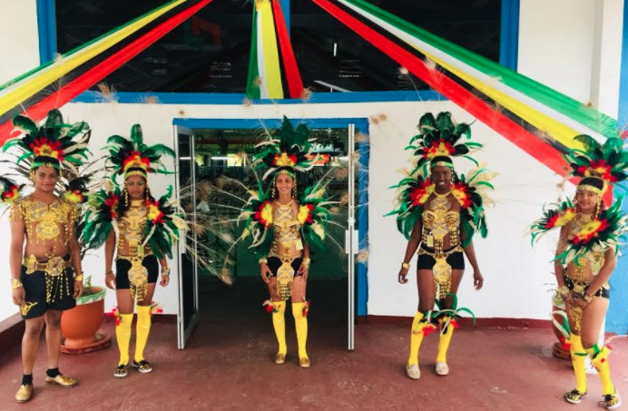 Arriving passengers getting Mashramani welcome at Cheddi Jagan Airport ...