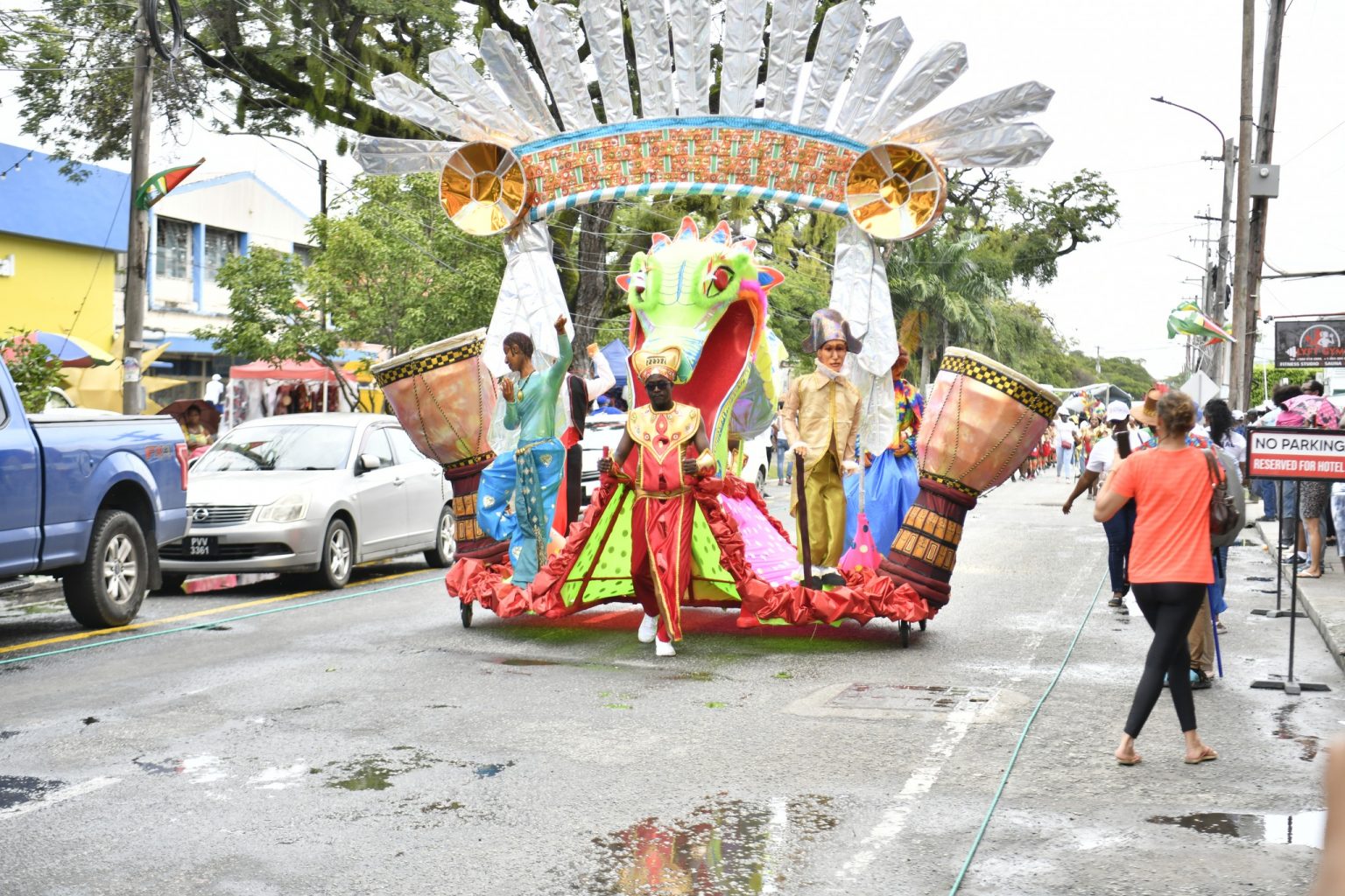 Rain dampens return of Mashramani float parade, but thousands line ...