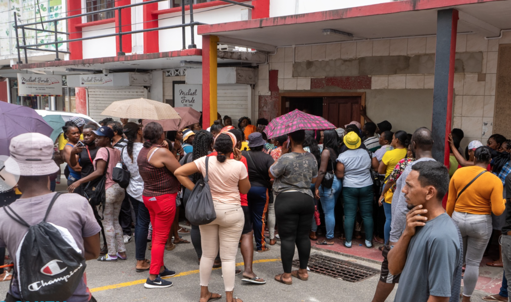 Hundreds fall for cash grant distribution "hoax" outside Freedom House ...